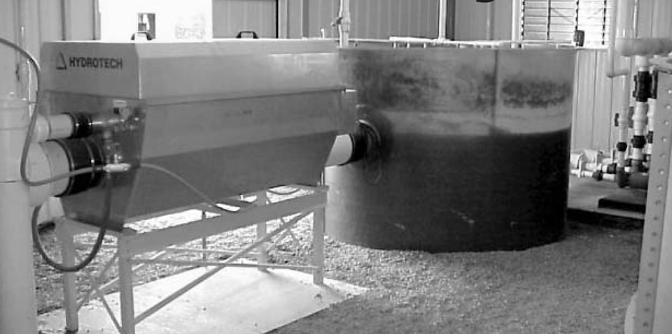 Drum filter efficiency as particle separator in a recirculated system ...